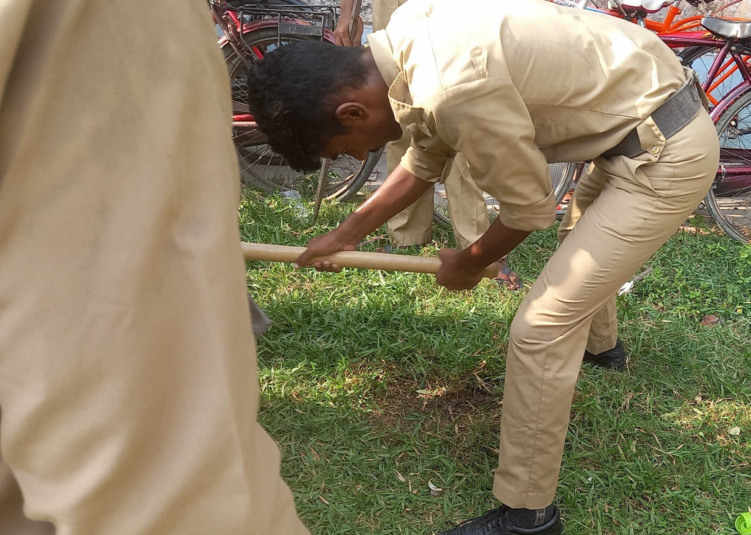 Cleaning School Ground – India NCC