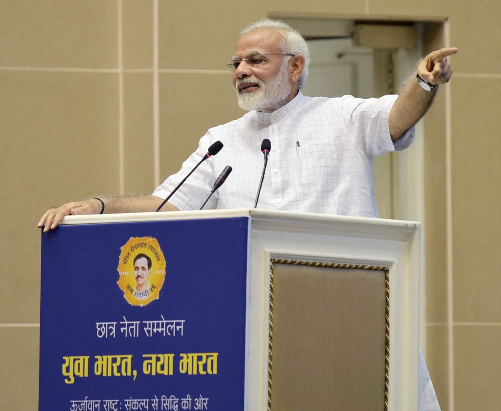 The Prime Minister, Shri Narendra Modi addressing a gathering of ...
